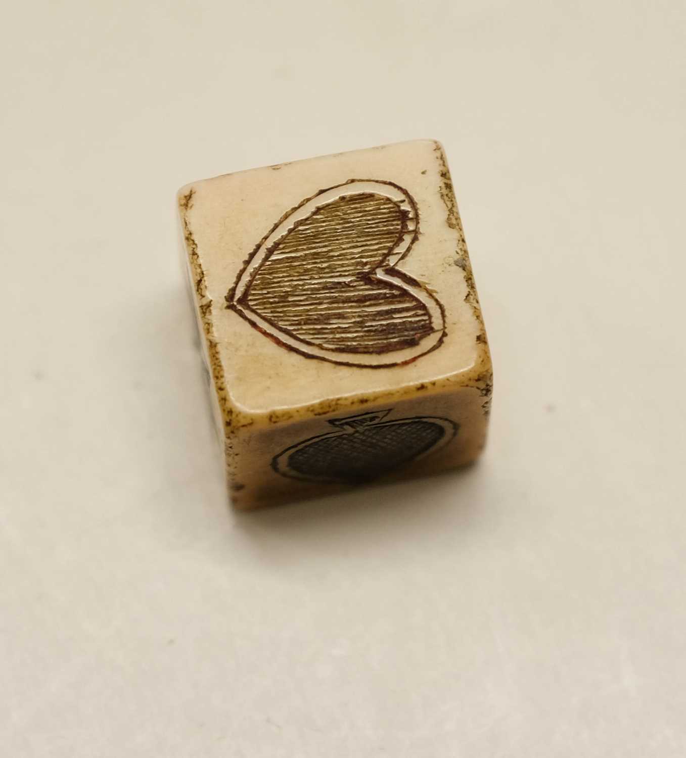 Lot 12 - Dice. A large sailors scrimshaw ivory dice